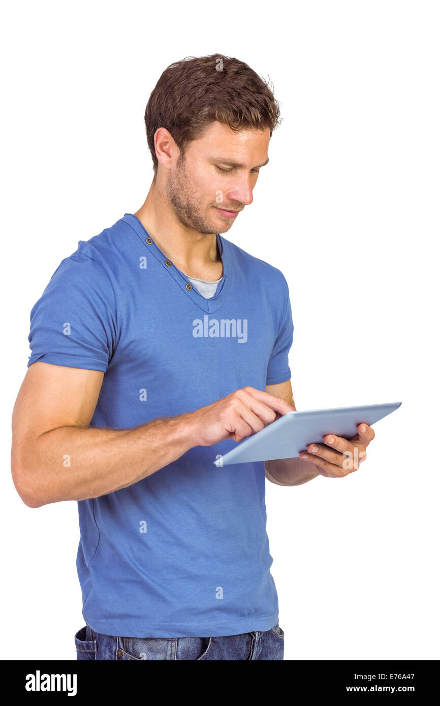 Man scrolling through tablet pc Stock Photo - Alamy
