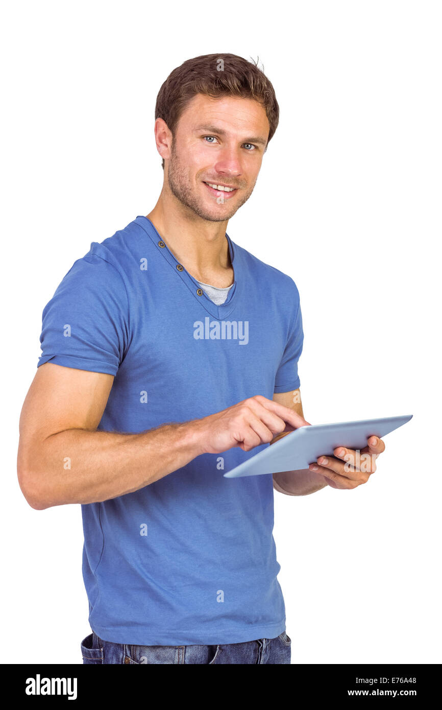 Man scrolling through tablet pc Stock Photo - Alamy