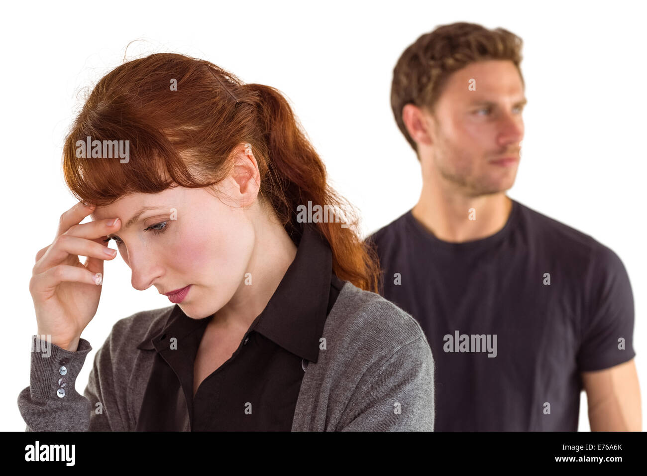 Worried woman with man behind Stock Photo - Alamy