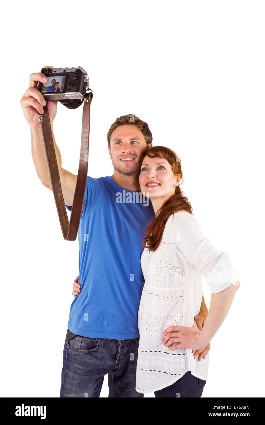 Couple using camera for picture Stock Photo - Alamy