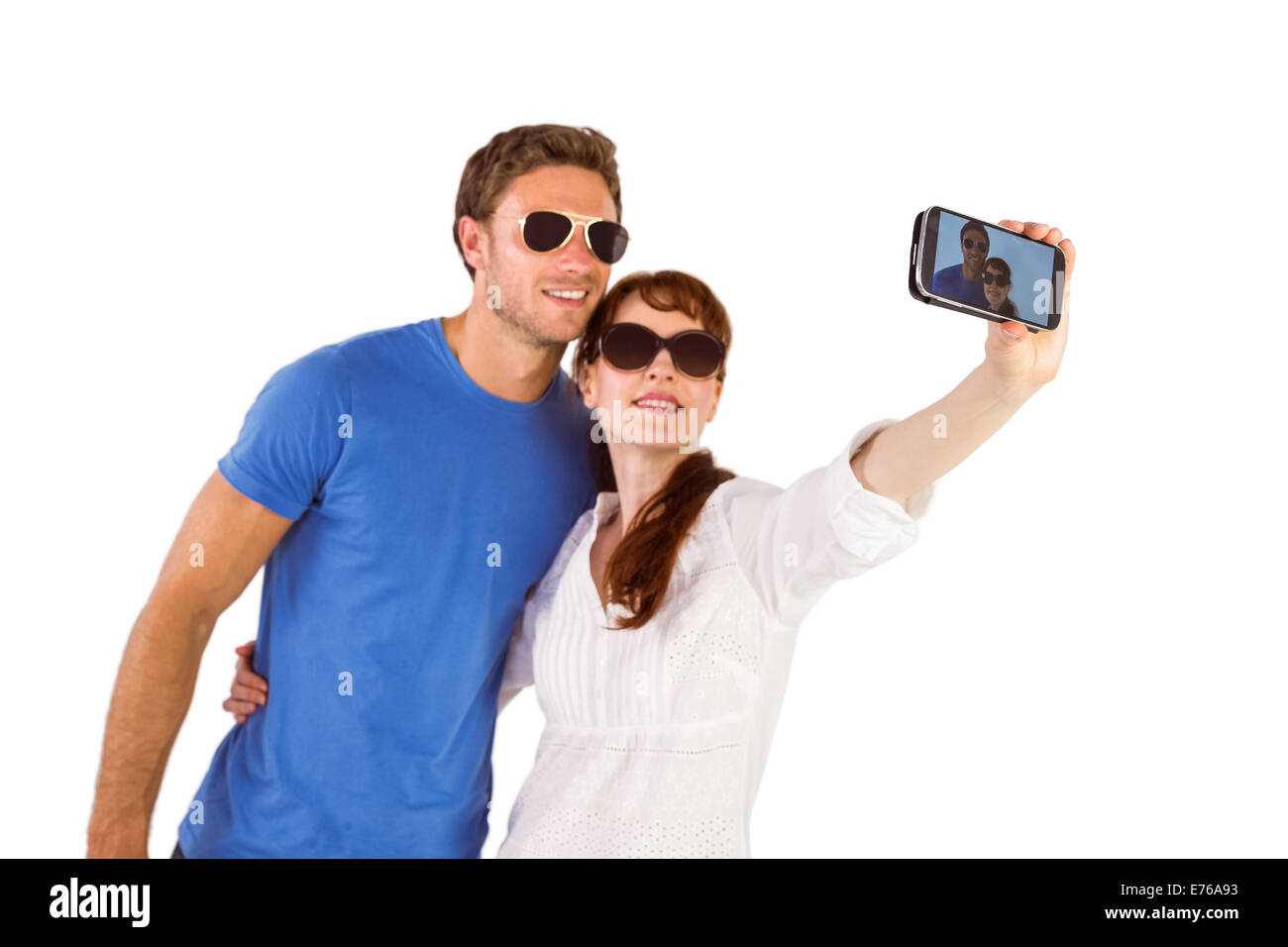 Couple using camera for picture Stock Photo - Alamy