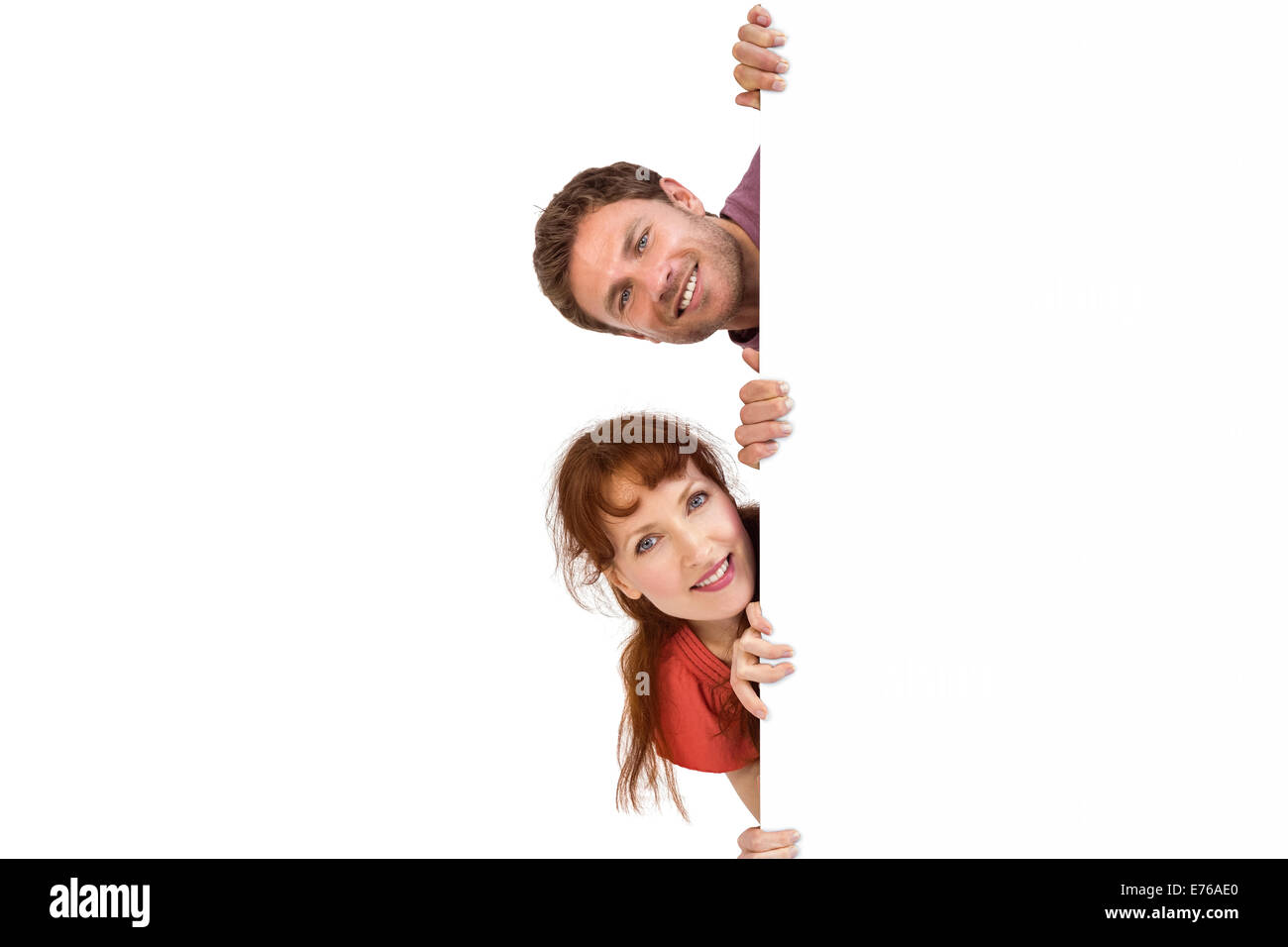 Couple looking at the camera Stock Photo - Alamy