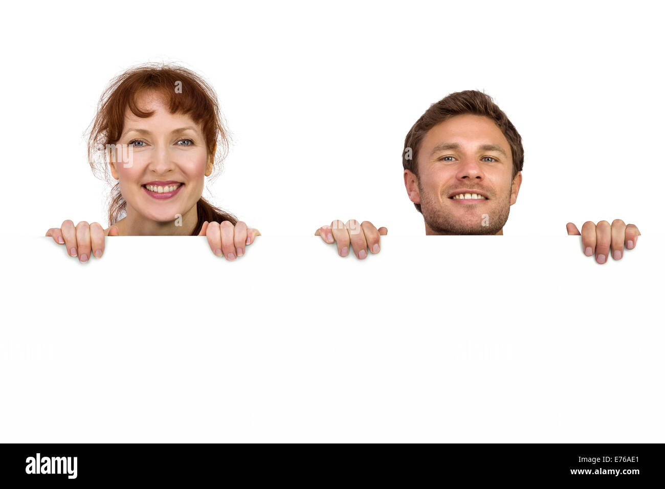 Couple looking at the camera Stock Photo - Alamy