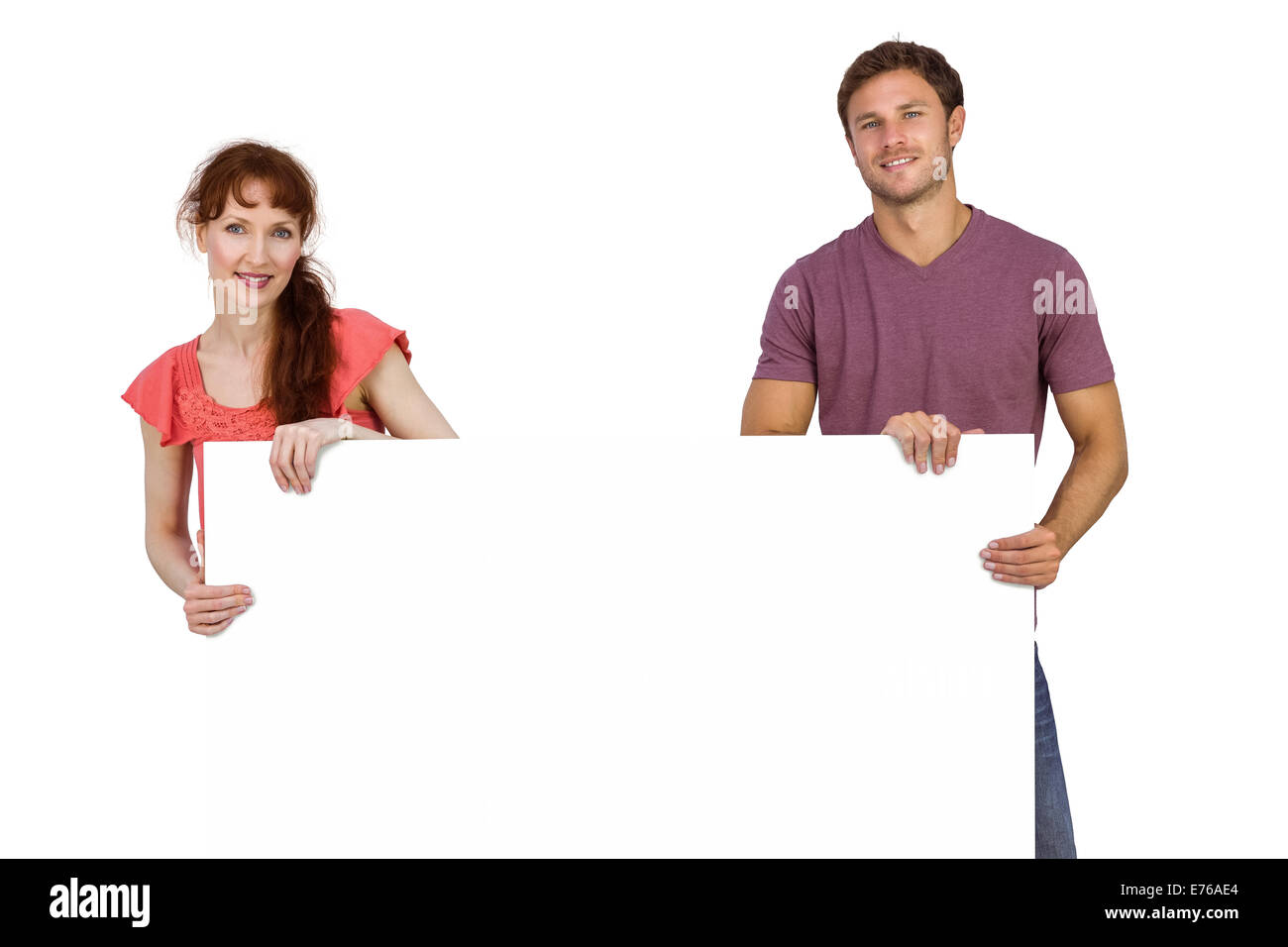 Couple looking at the camera Stock Photo - Alamy