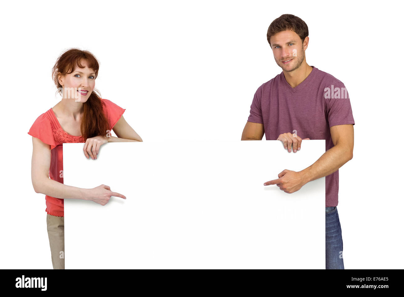 Couple looking at the camera Stock Photo - Alamy