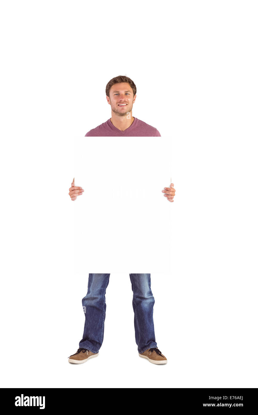 Man holding up a sign Stock Photo - Alamy