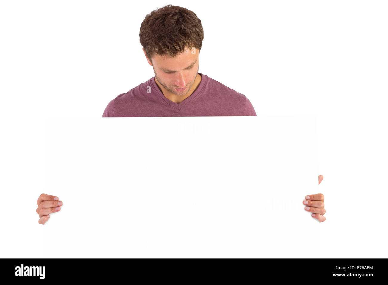 Man holding up a sign Stock Photo - Alamy