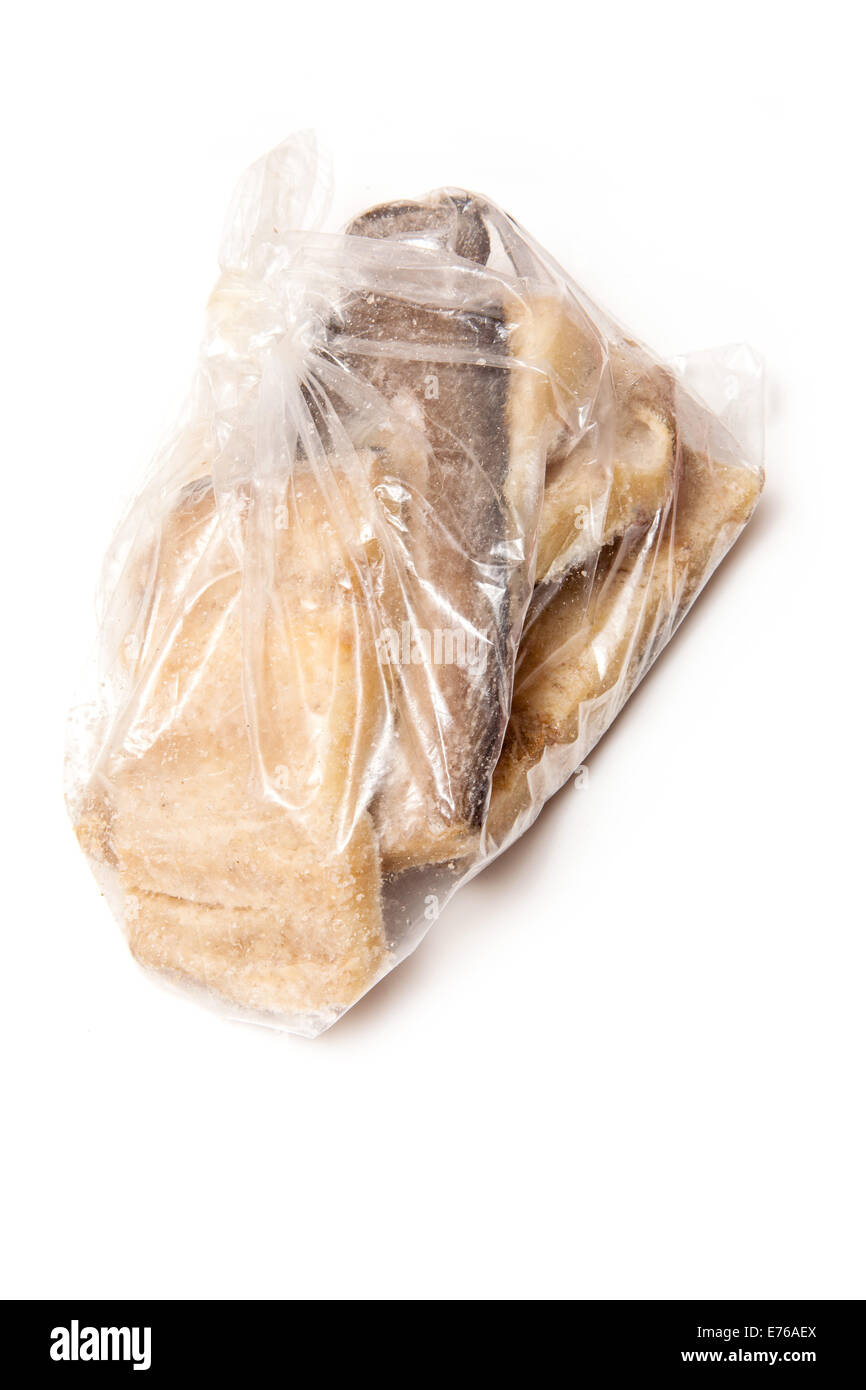 Packet of salt cod fish isolated on a white studio background Stock ...