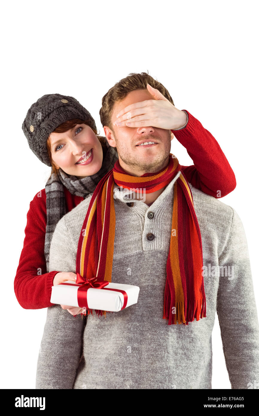 Woman giving man a present Stock Photo - Alamy