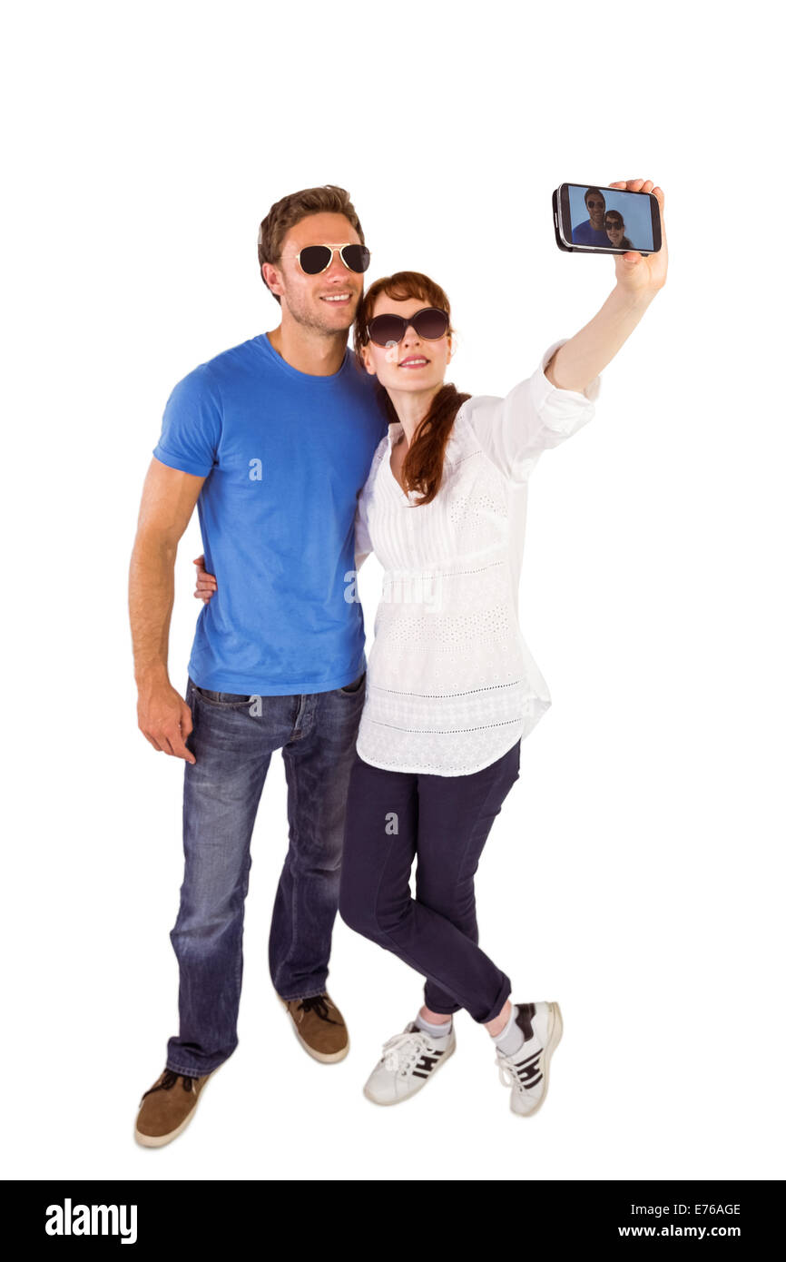 Couple using camera for picture Stock Photo - Alamy