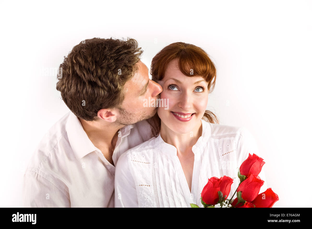Woman getting roses from man Stock Photo - Alamy
