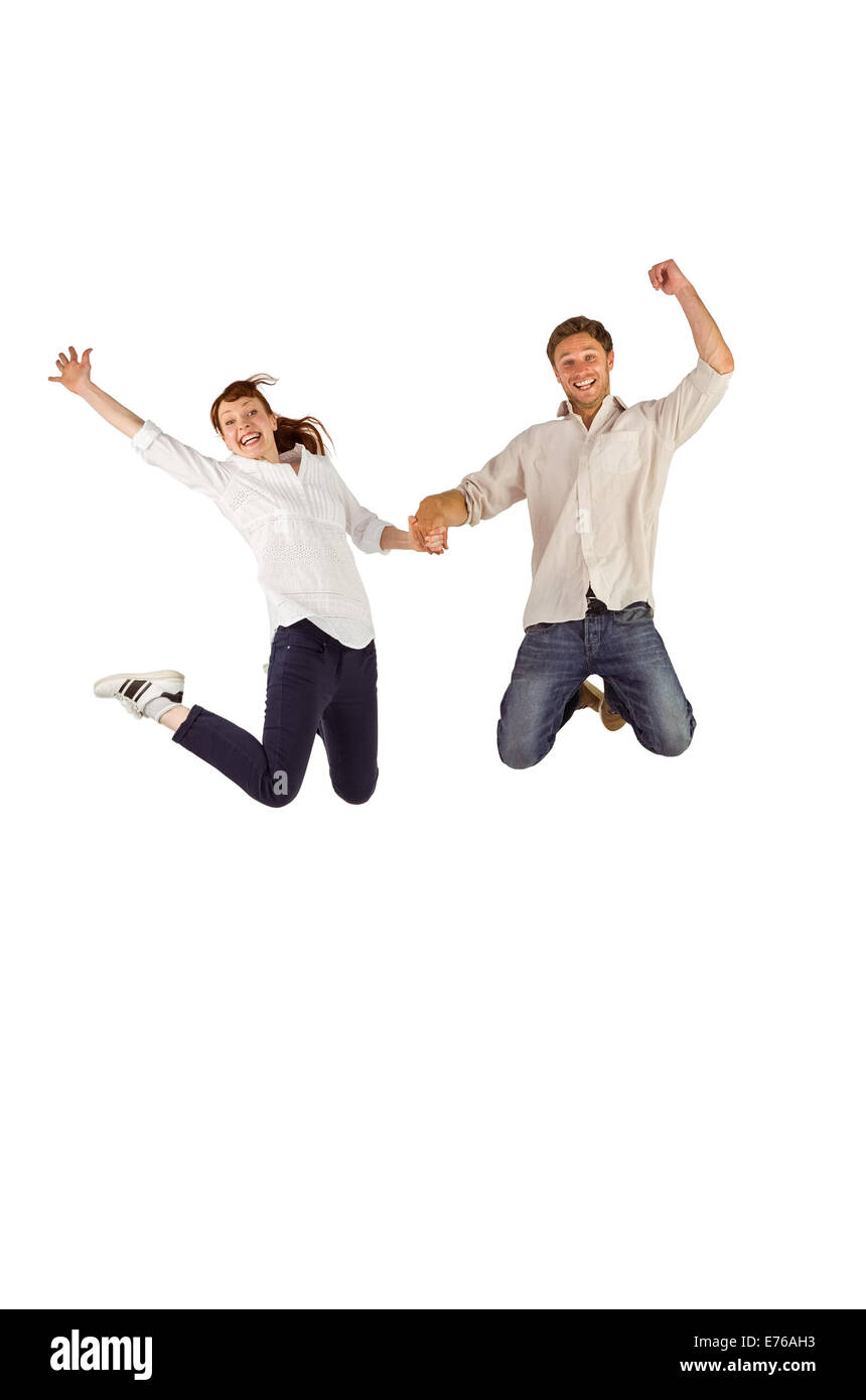 Jumping holding hands hi-res stock photography and images - Alamy