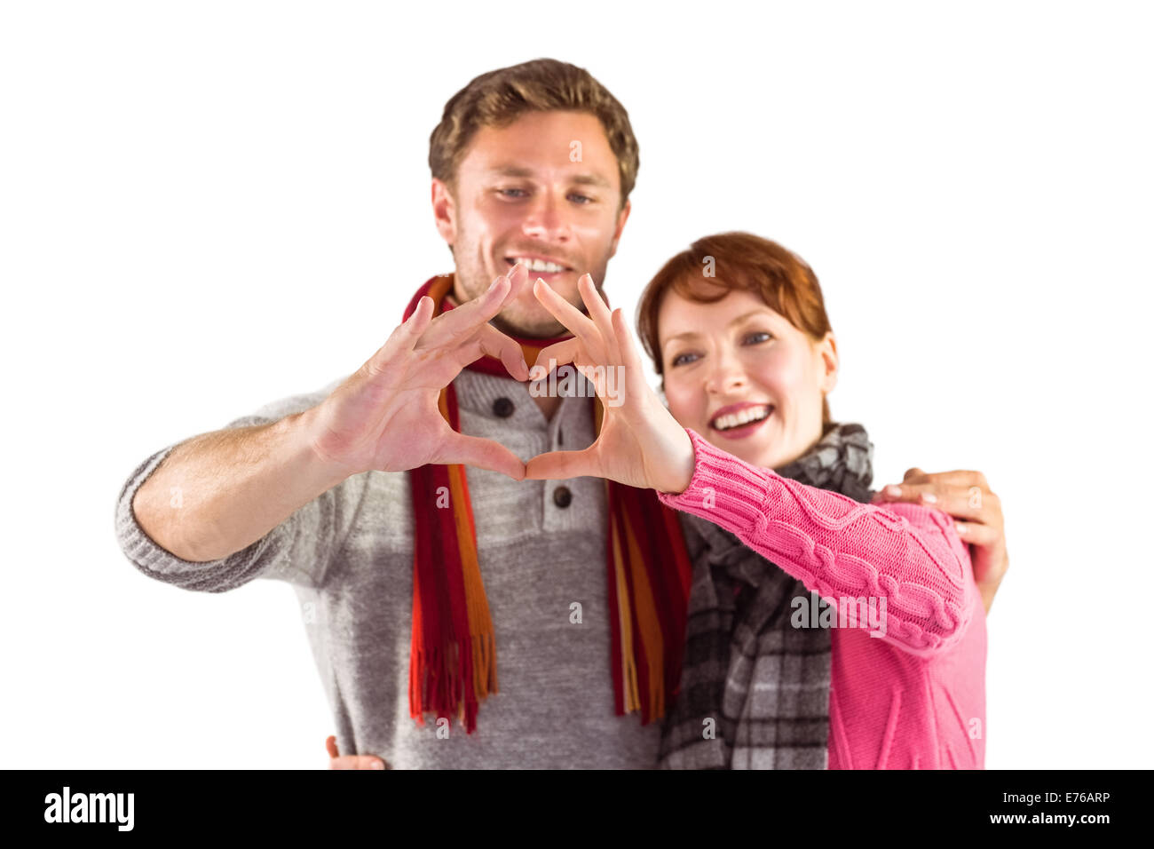 Couple making a heart shape Stock Photo - Alamy