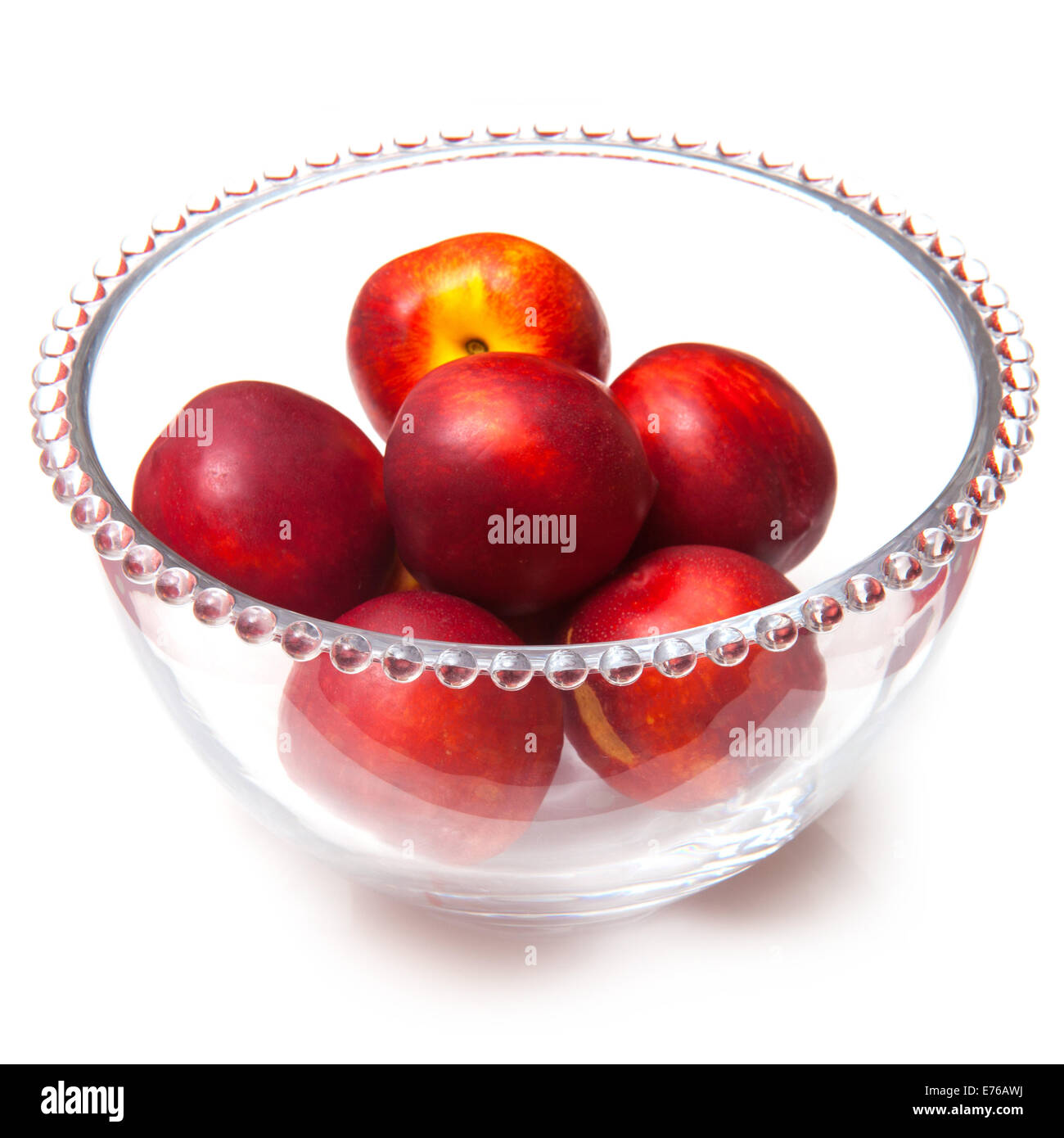 Nectarines isolated on a white studio background Stock Photo - Alamy
