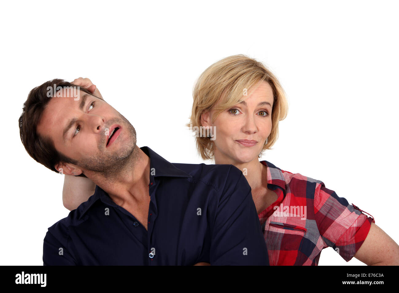 Wife pushing husband's head Stock Photo - Alamy