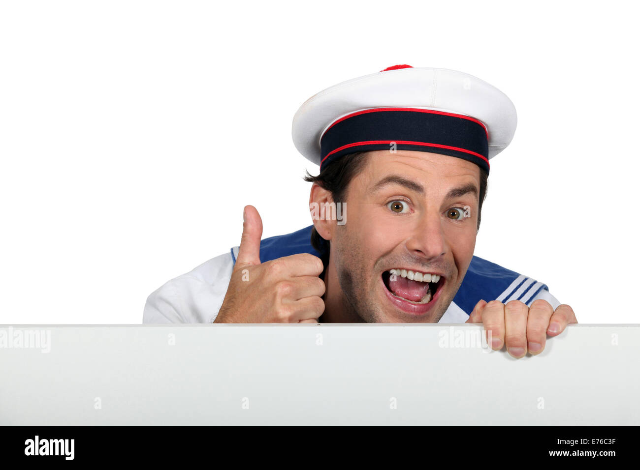 Silly sailor with a board Stock Photo - Alamy
