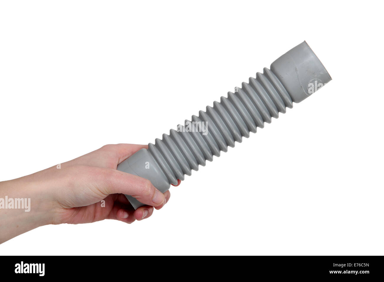 Hand holding corrugated pipe Stock Photo - Alamy