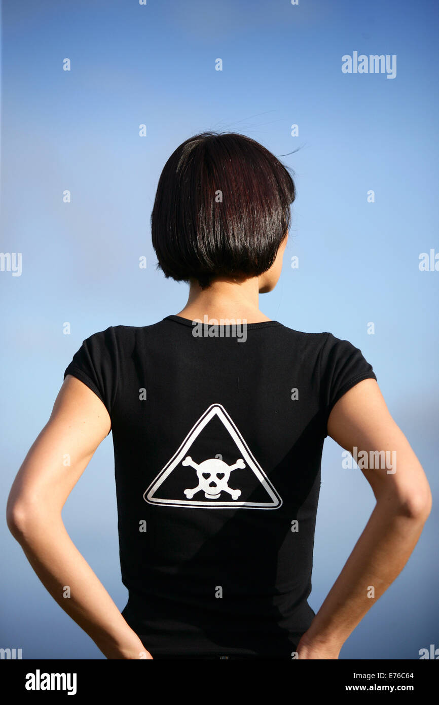 Woman stood outdoors with back to the camera Stock Photo - Alamy