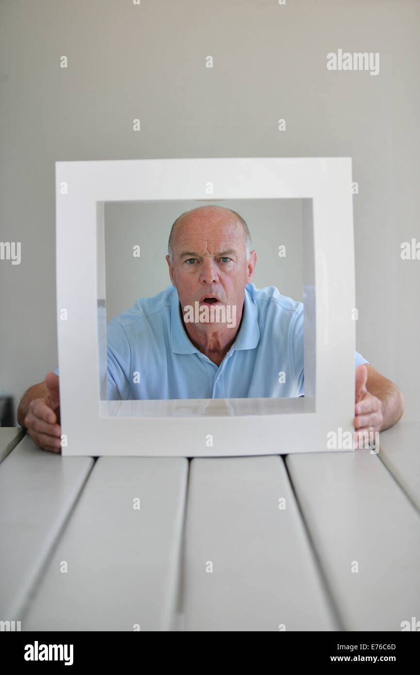Surprised elderly man framed hi-res stock photography and images - Alamy