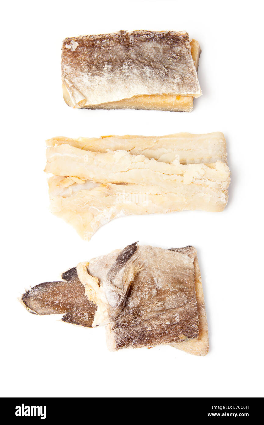 Pieces of salt cod fish isolated on a white studio background Stock ...