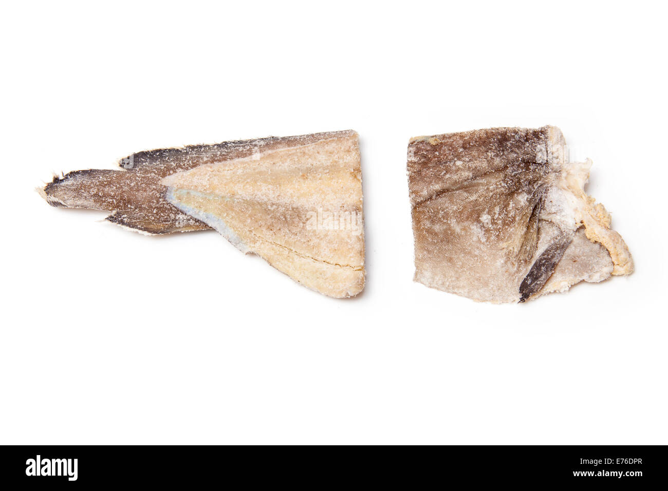 Pieces of salt cod fish isolated on a white studio background Stock ...