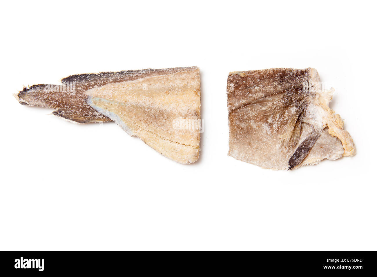 Pieces of salt cod fish isolated on a white studio background Stock ...
