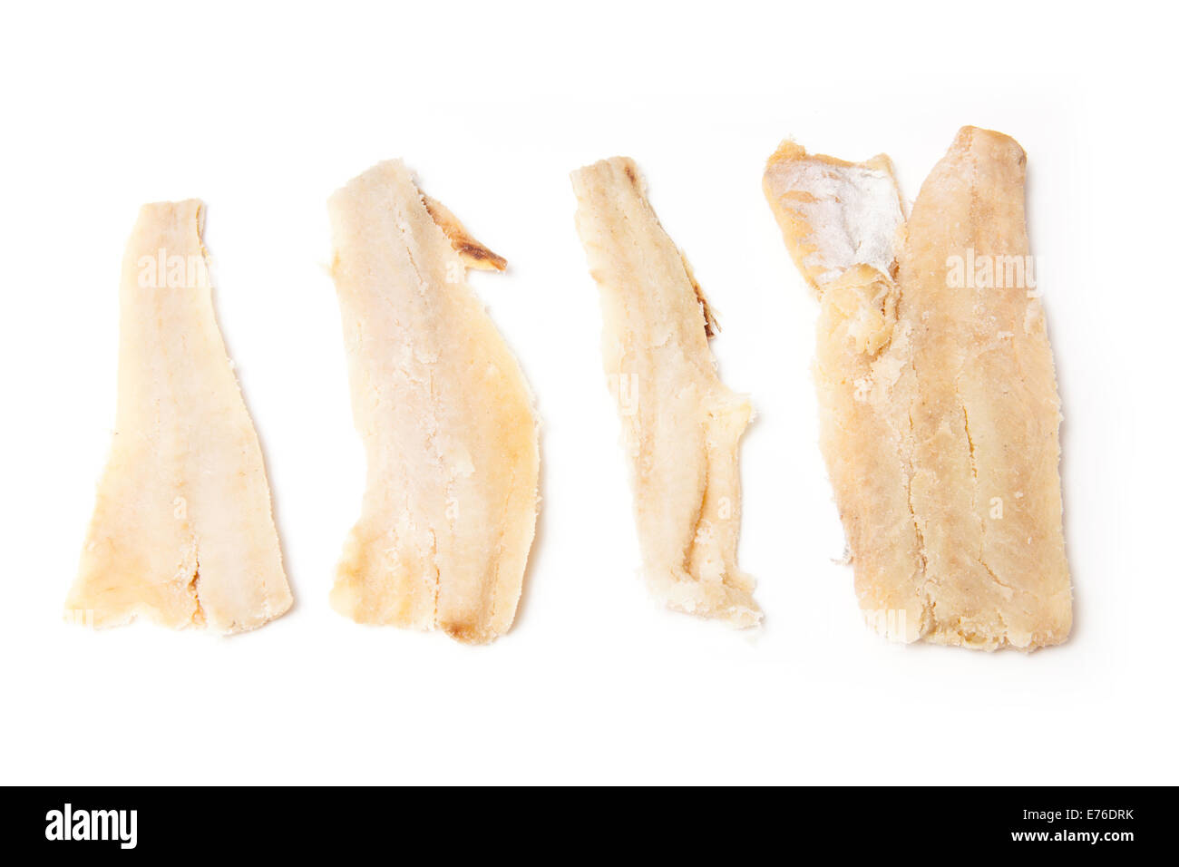 Pieces of salt cod fish isolated on a white studio background Stock ...