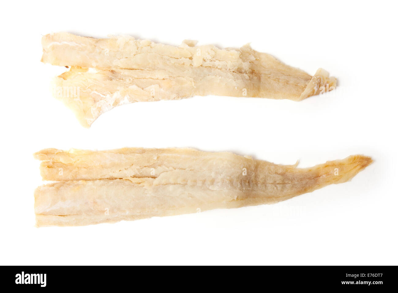 Pieces of salt cod fish isolated on a white studio background Stock ...