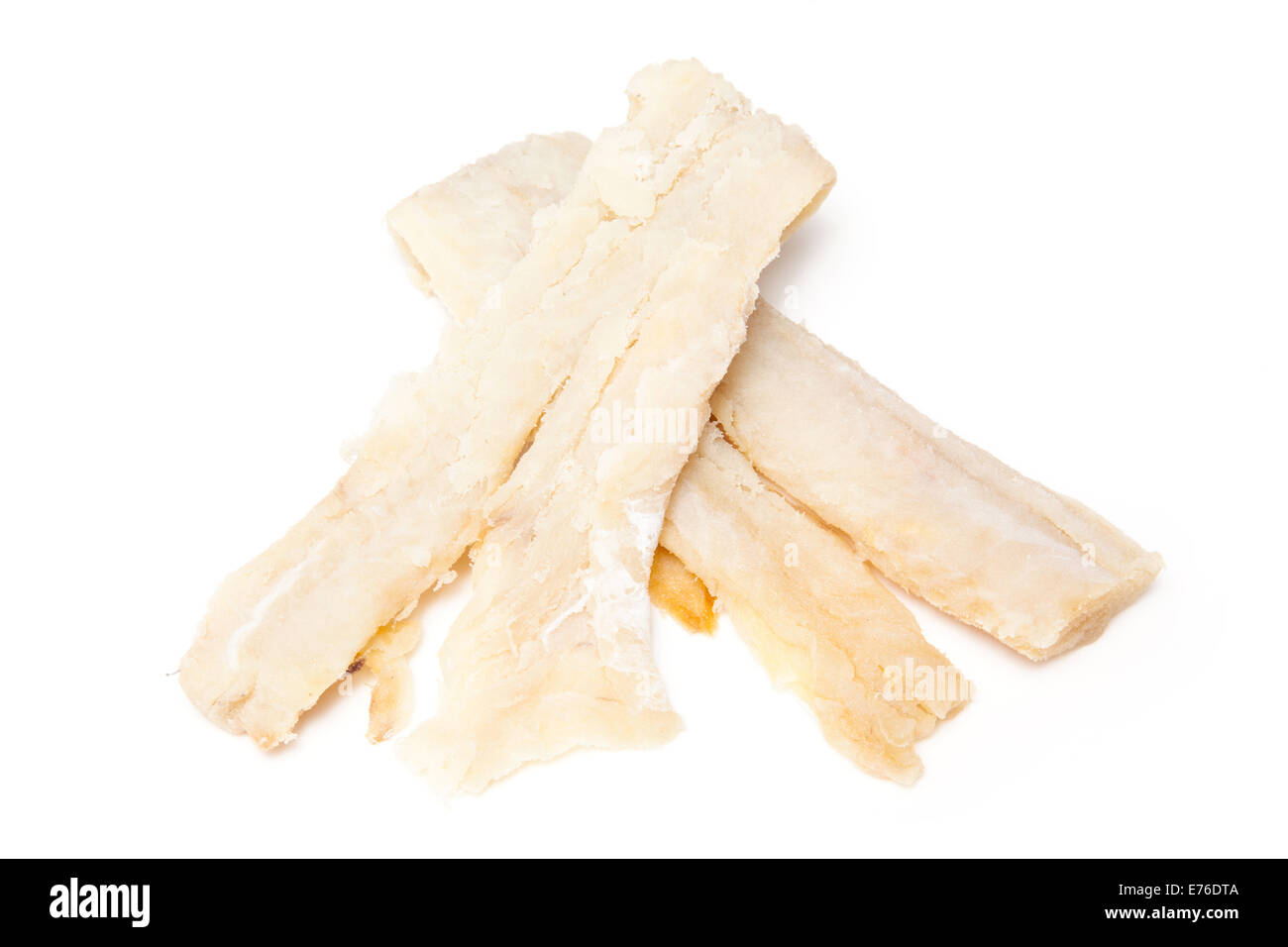 Pieces of salt cod fish isolated on a white studio background Stock ...