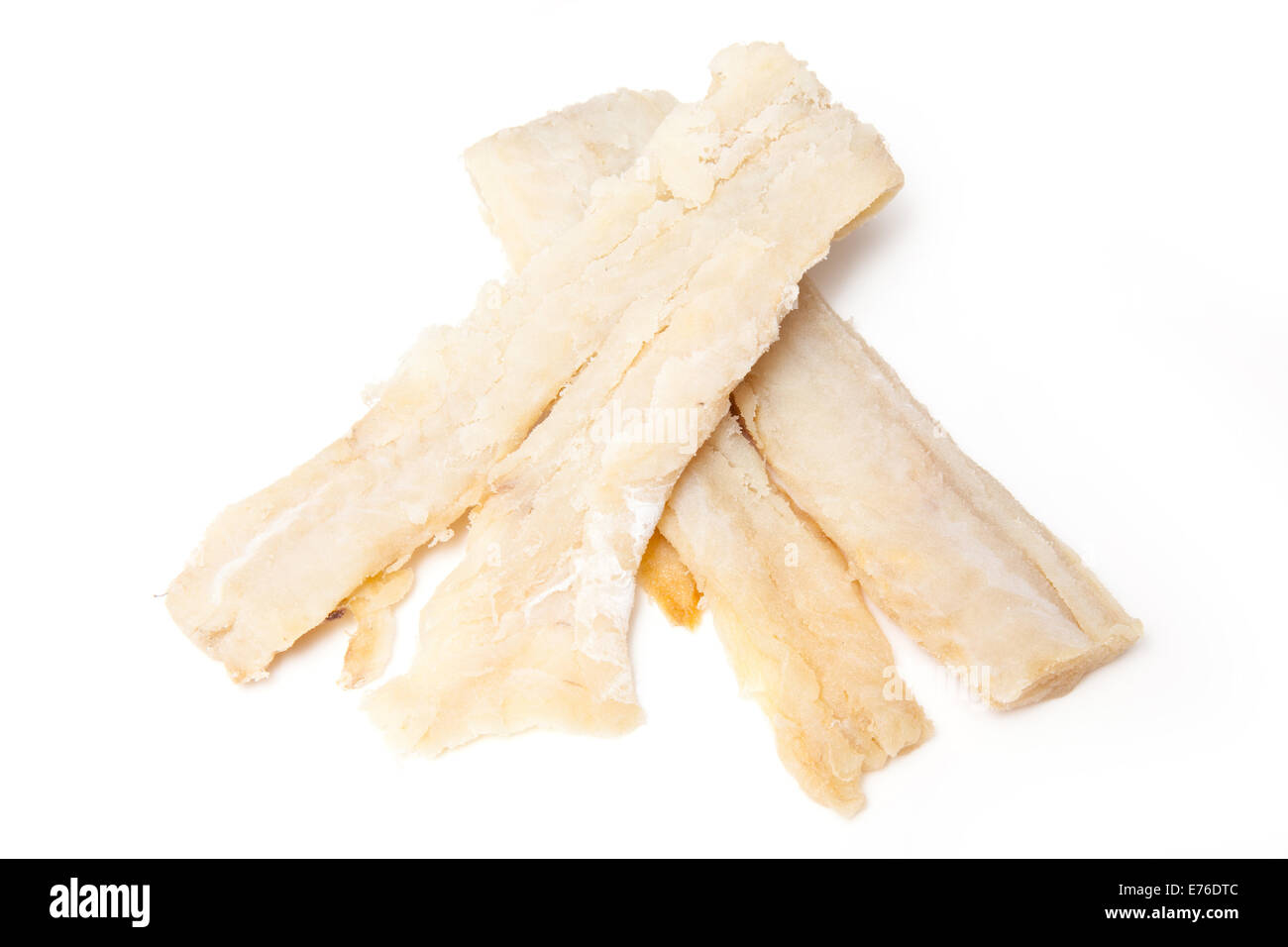 Pieces of salt cod fish isolated on a white studio background Stock ...