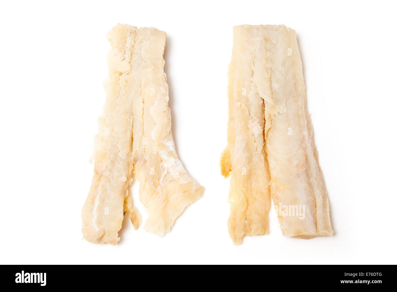 Pieces of salt cod fish isolated on a white studio background Stock ...