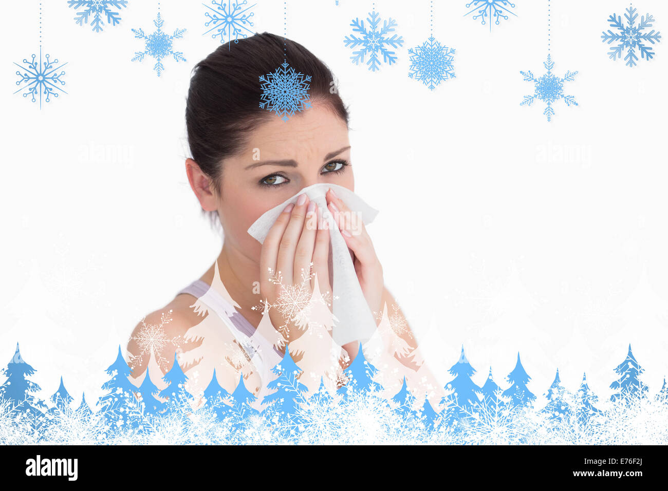 Composite image of sad woman blowing her nose Stock Photo - Alamy