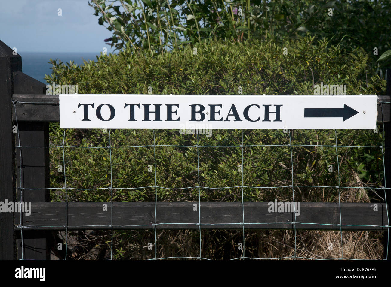 Beach Sign in Summer Light Stock Photo - Alamy