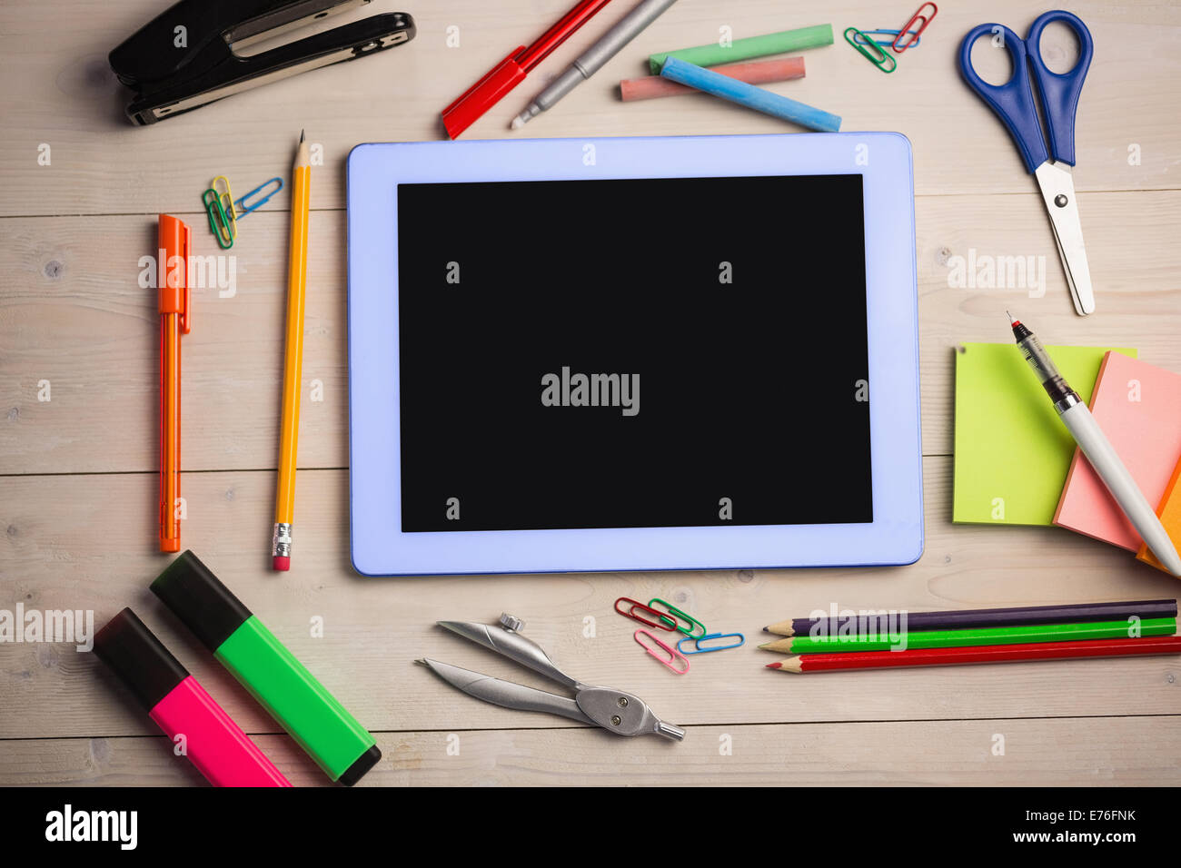 Students table with school supplies Stock Photo - Alamy