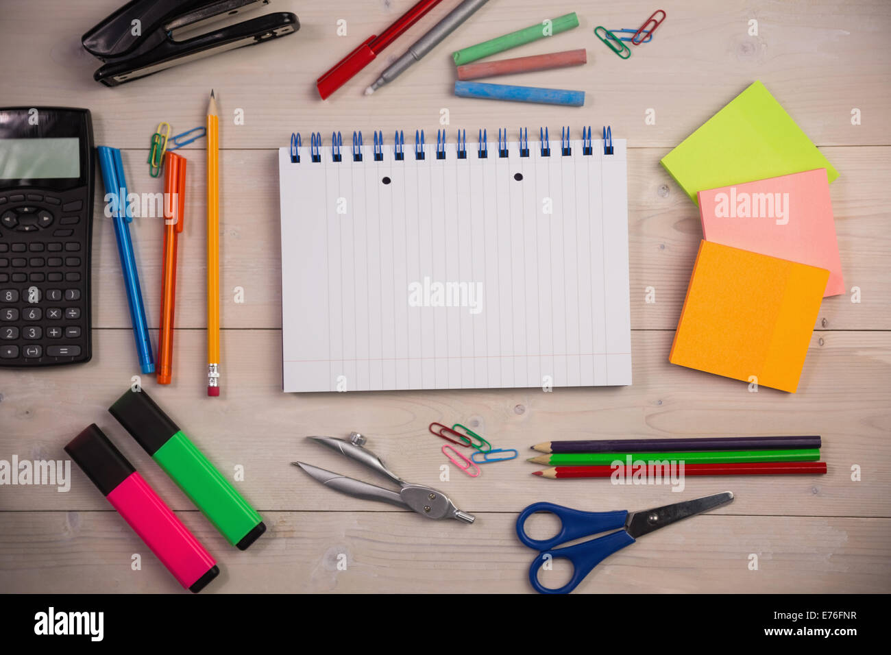 Students table with school supplies Stock Photo - Alamy