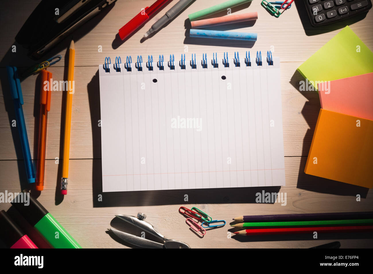 Students table with school supplies Stock Photo - Alamy