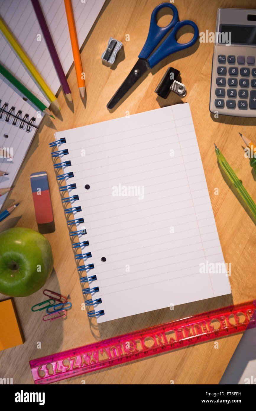 Students table with school supplies Stock Photo - Alamy