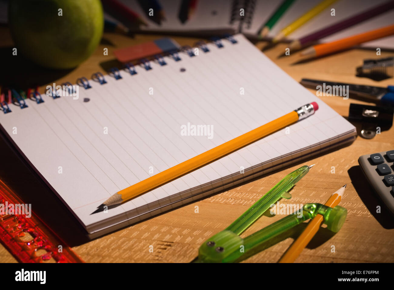 Students table with school supplies Stock Photo - Alamy