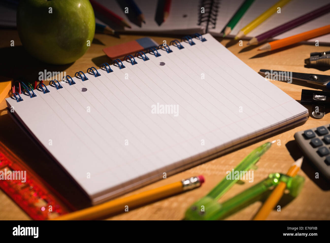 Students table with school supplies Stock Photo - Alamy