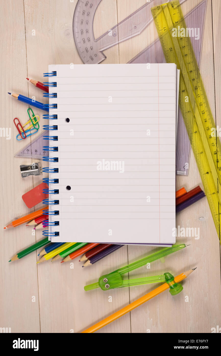Students table with school supplies Stock Photo - Alamy