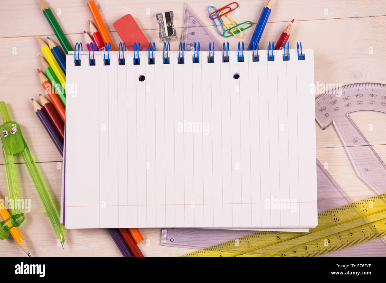Students table with school supplies Stock Photo - Alamy