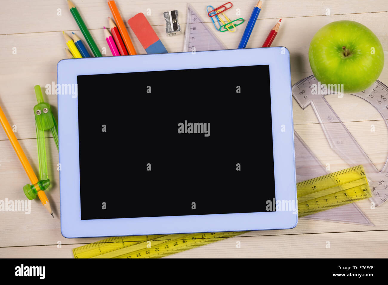Students table with school supplies Stock Photo - Alamy