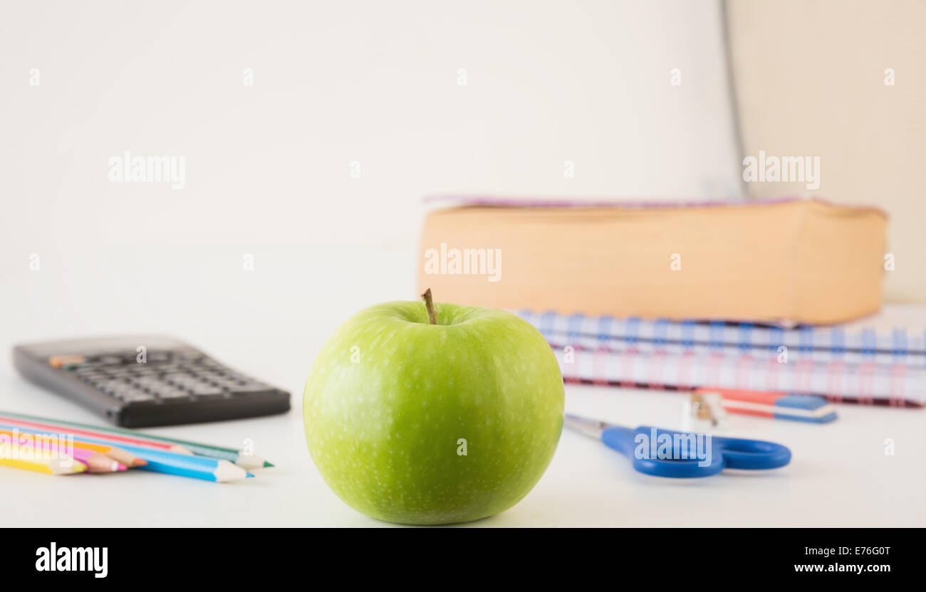 Students table with school supplies Stock Photo - Alamy