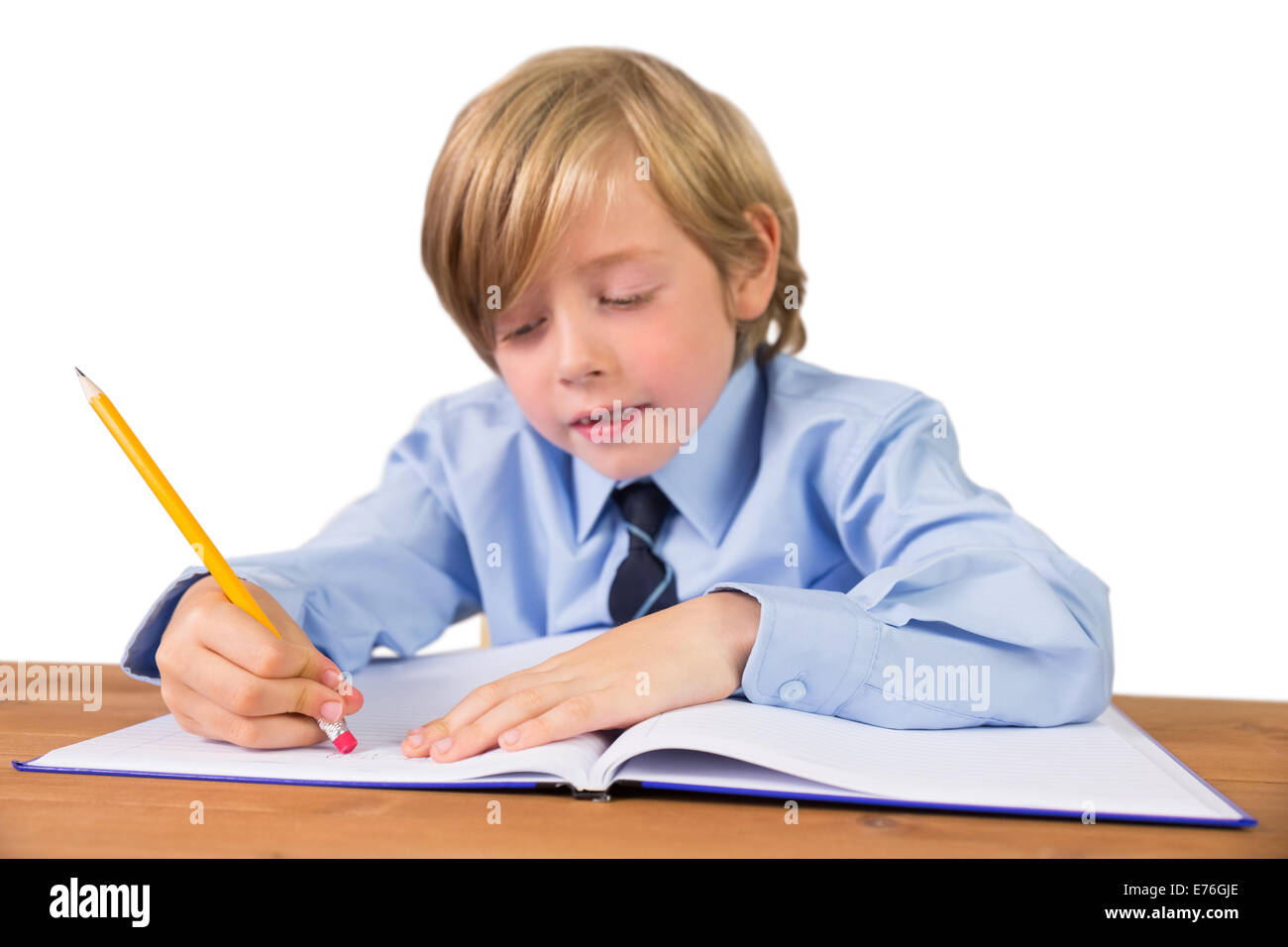 Student writing notes in notepad Stock Photo - Alamy