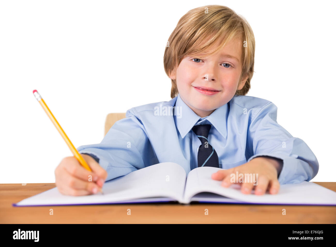 Student writing notes in notepad Stock Photo - Alamy