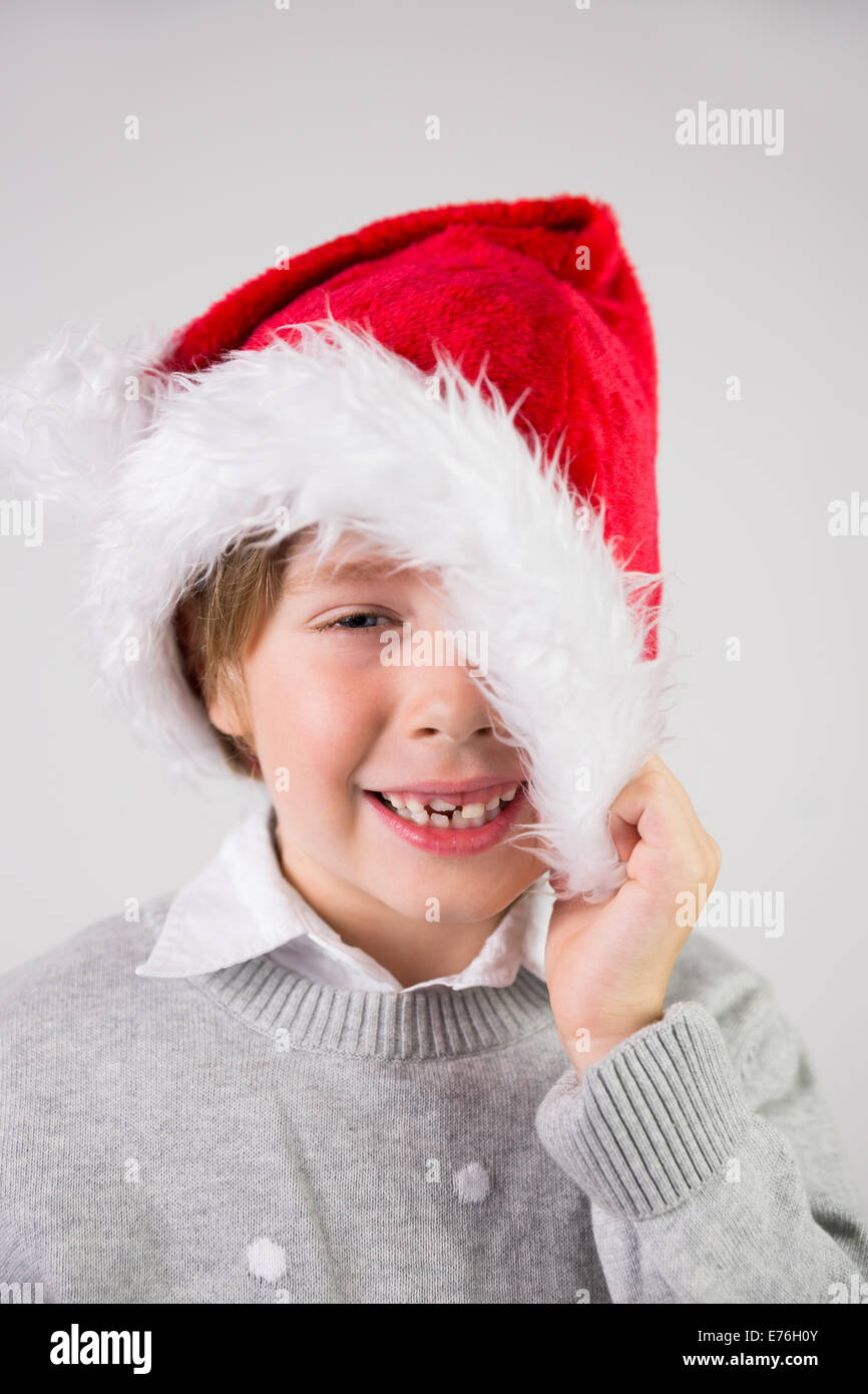 Child wearing a santa hat Stock Photo - Alamy