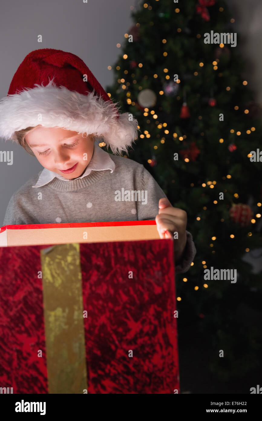 Child opening his christmas present Stock Photo - Alamy