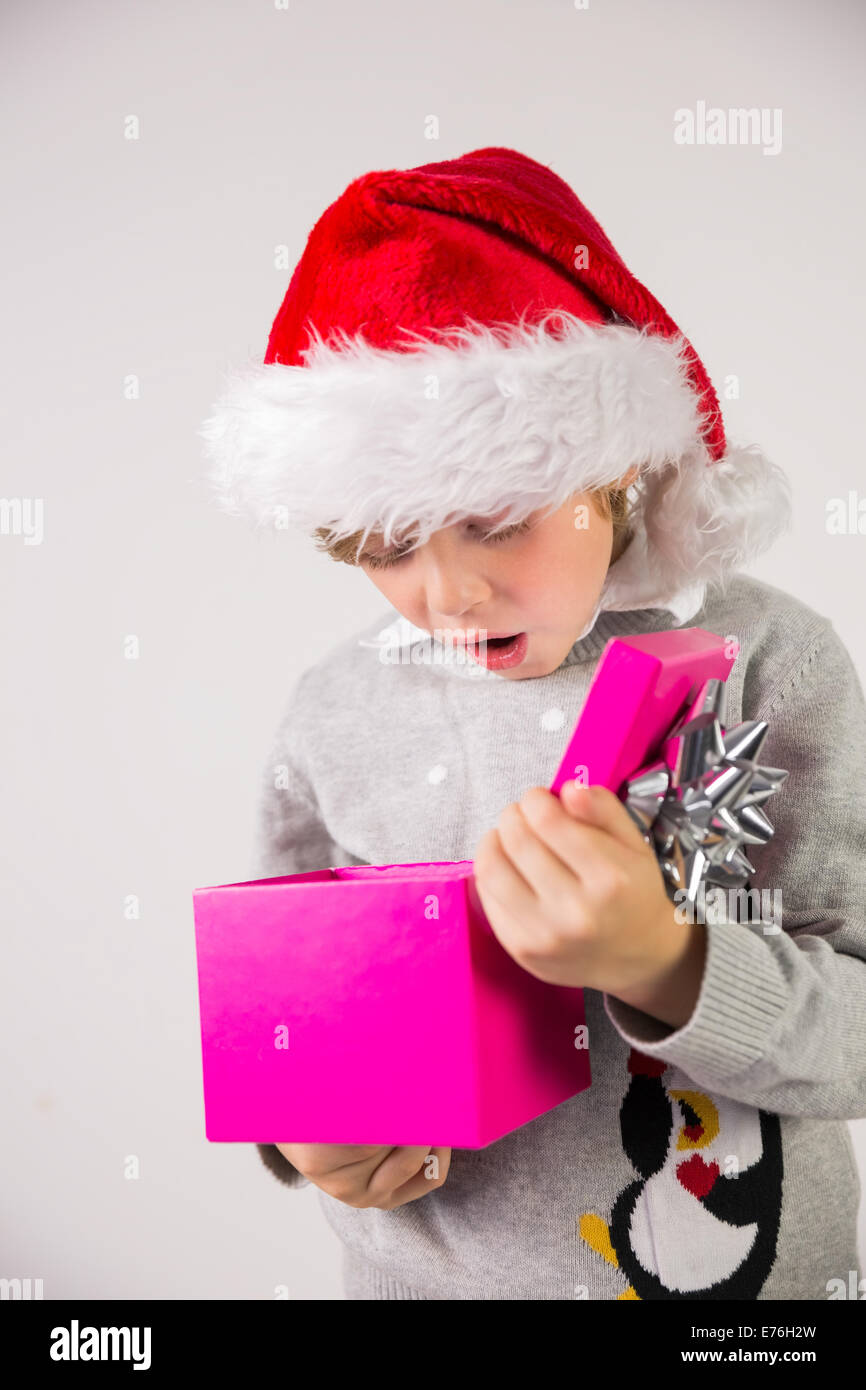 Child opening his christmas present Stock Photo - Alamy