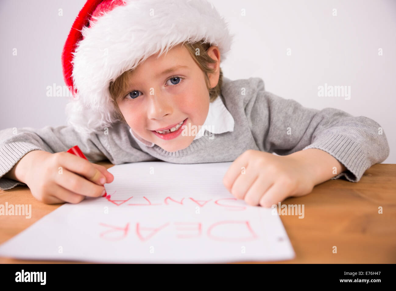 Child writing letter to santa Stock Photo - Alamy