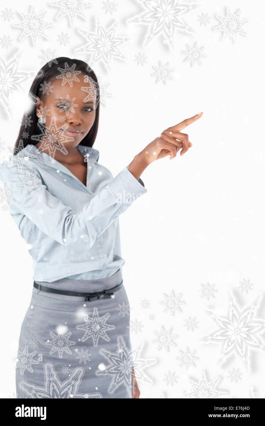 Composite image of portrait of a cute businesswoman pressing an ...